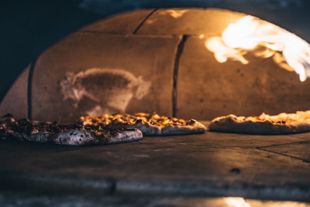Rotating pizza oven fuels Firezza's move into real estate